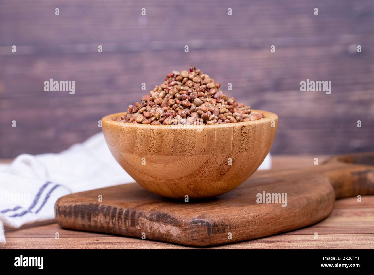 Sumac seeds. Dried sumac berries on wooden background. Spice concept ...