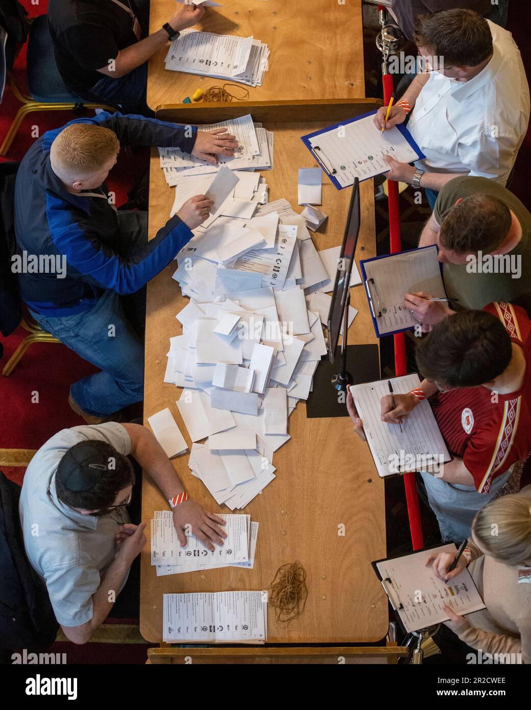Ballots are tallied in the Great Hall of Belfast City Hall as counting ...
