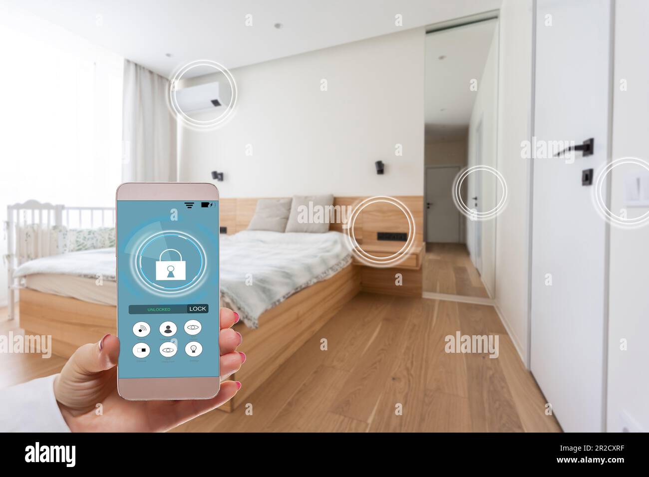 Smart home technology interface on smartphone app screen with augmented ...