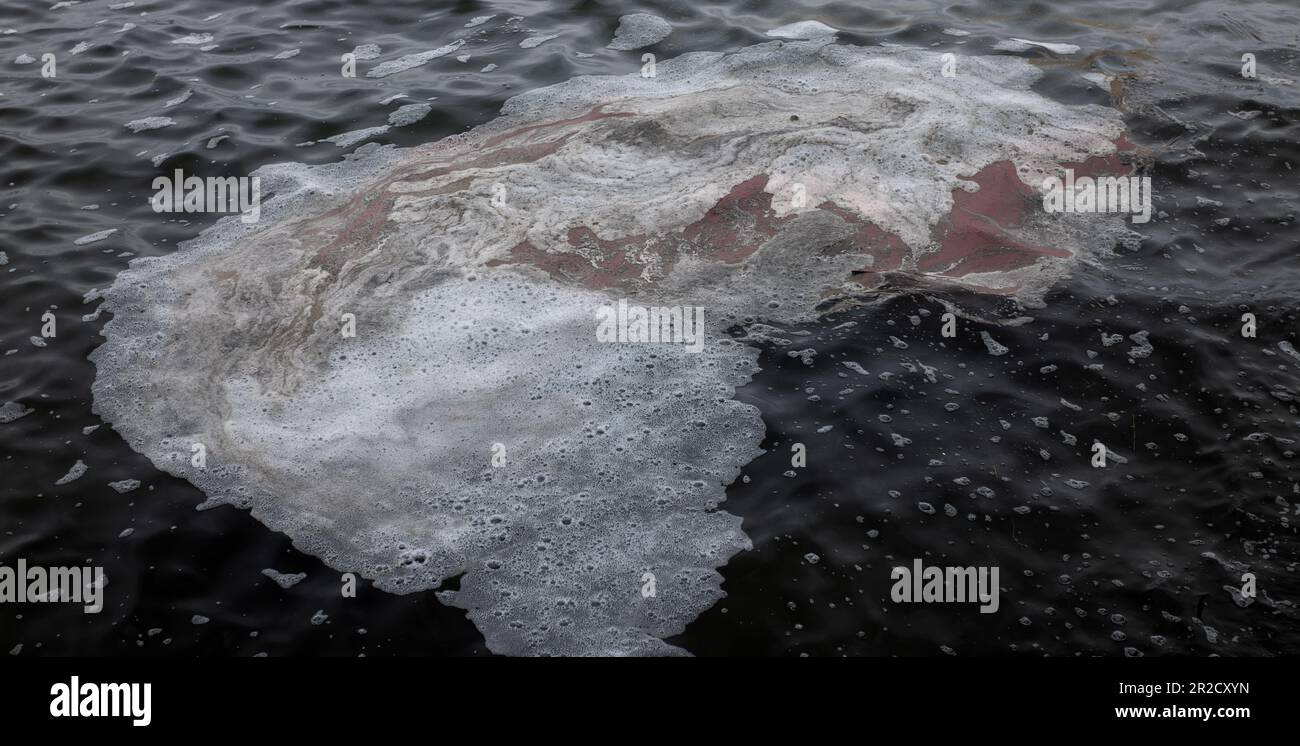 Dirty wave with mud foam. Dirty sea surf lines made of algae in the ...