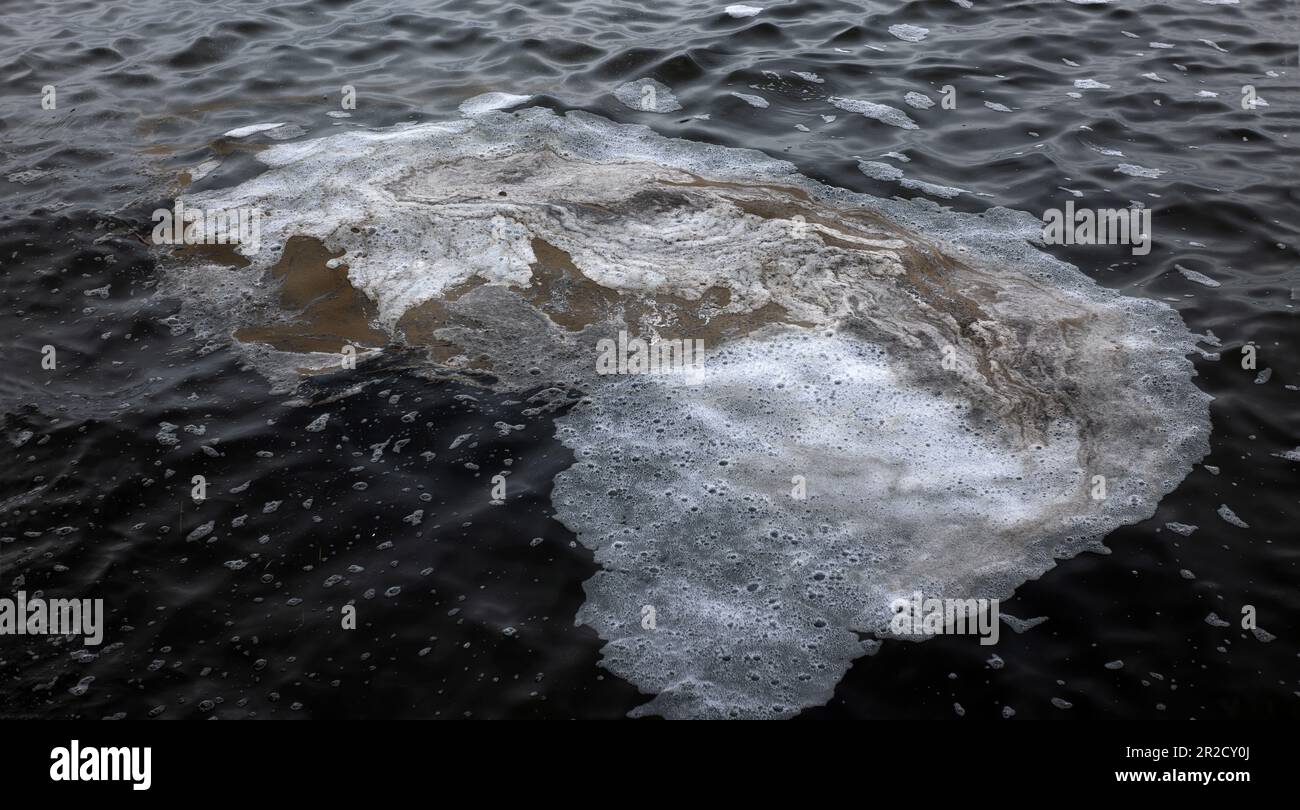 Dirty wave with mud foam. Dirty sea surf lines made of algae in the ...