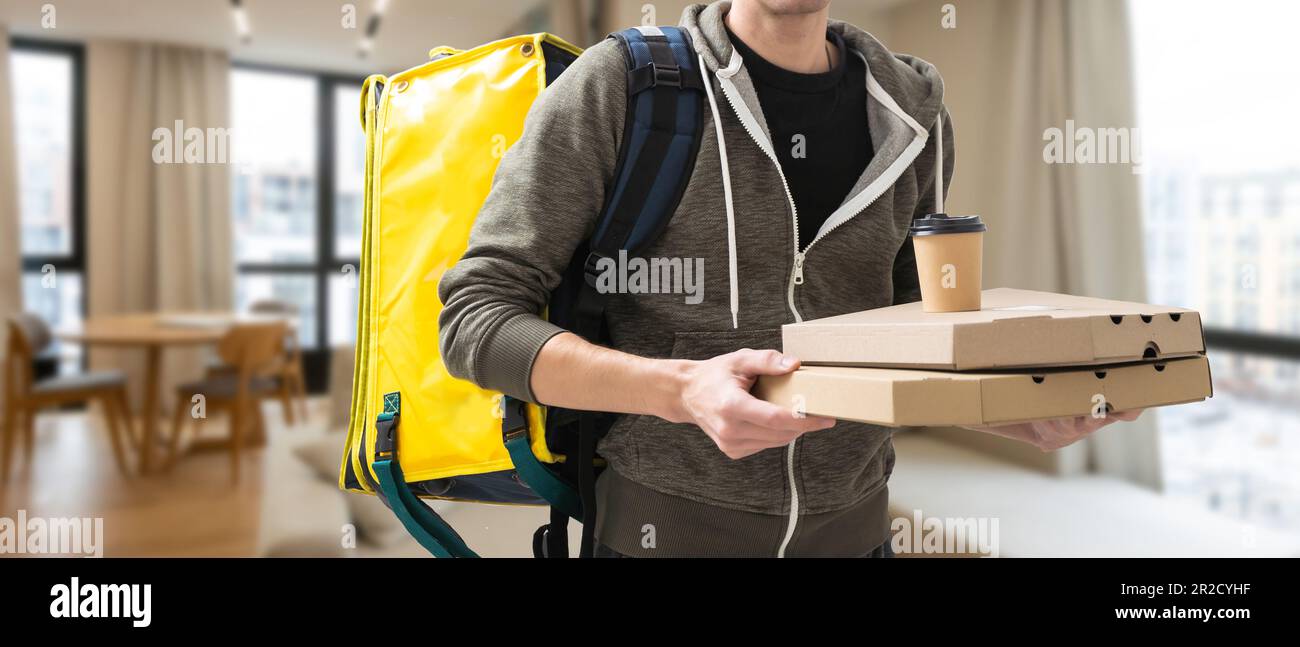 Delivery employee man hold thermal bag backpack with food work as ...