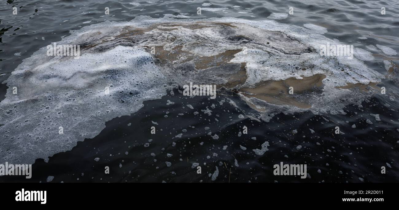 Dirty wave with mud foam. Dirty sea surf lines made of algae in the ...