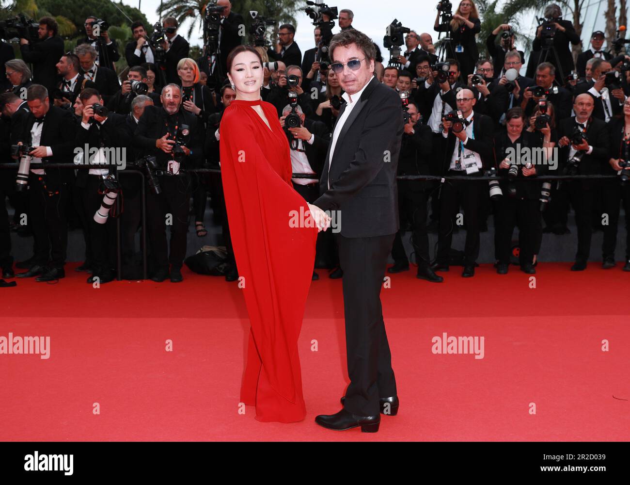 Cannes, France. 18th May, 2023. Actress Gong Li (L) and her husband ...