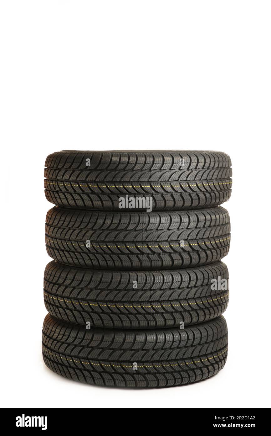 Four black tires isolated on white background. Top view Stock Photo - Alamy