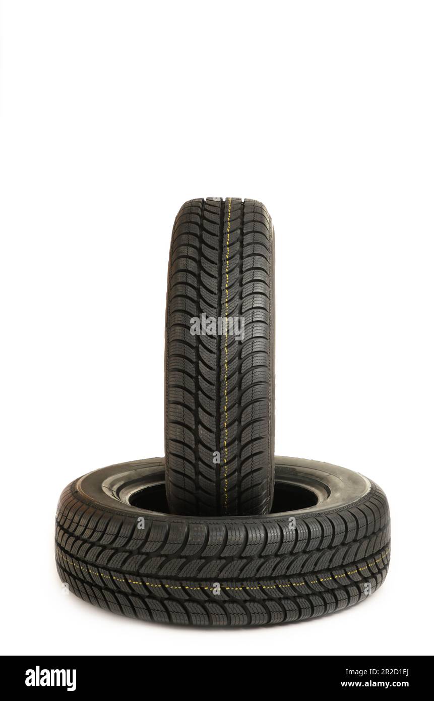 New tires pile isolated on white background. Top view Stock Photo - Alamy