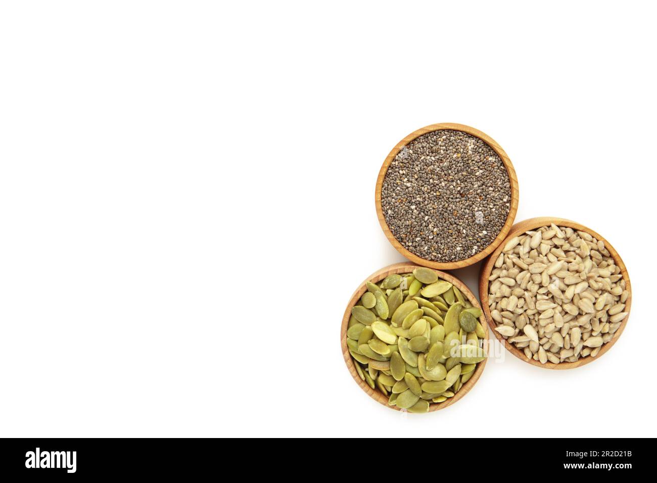 Pumpkin seeds, chia, sunflowers seeds in bowl isolated on white ...