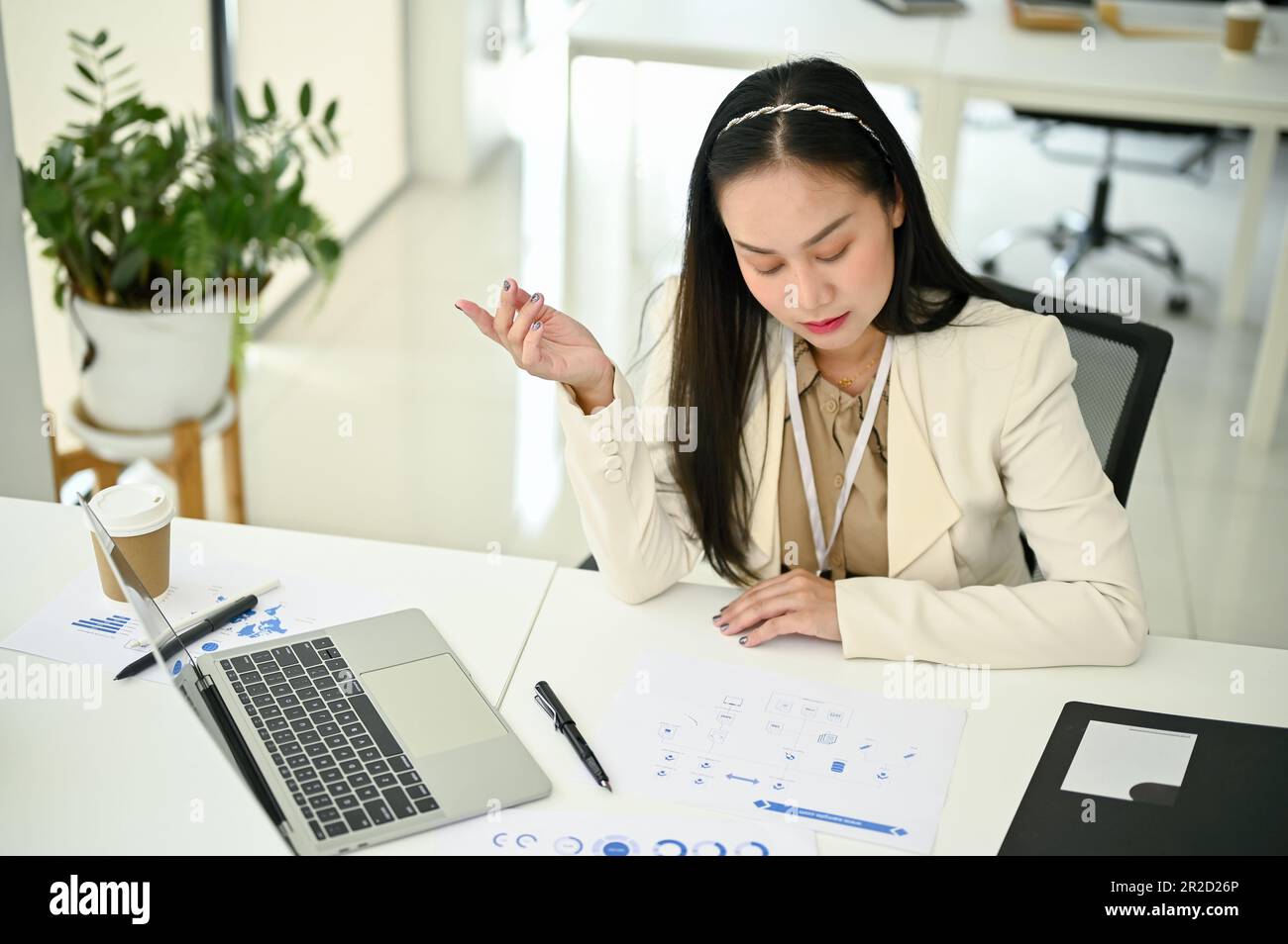Professional focused millennial asian hi-res stock photography and ...