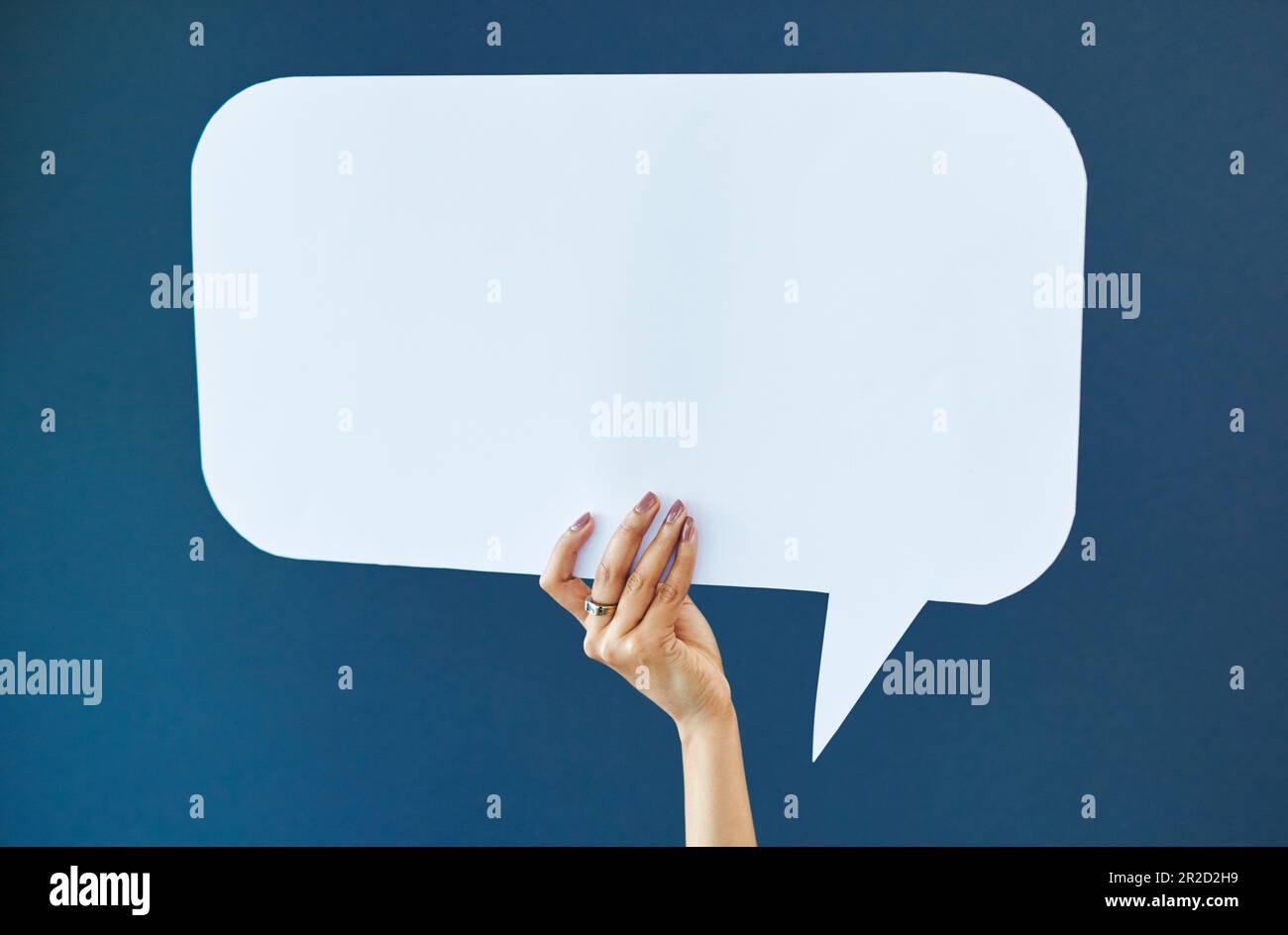Hand, speech bubble and woman in studio with banner, news or ...