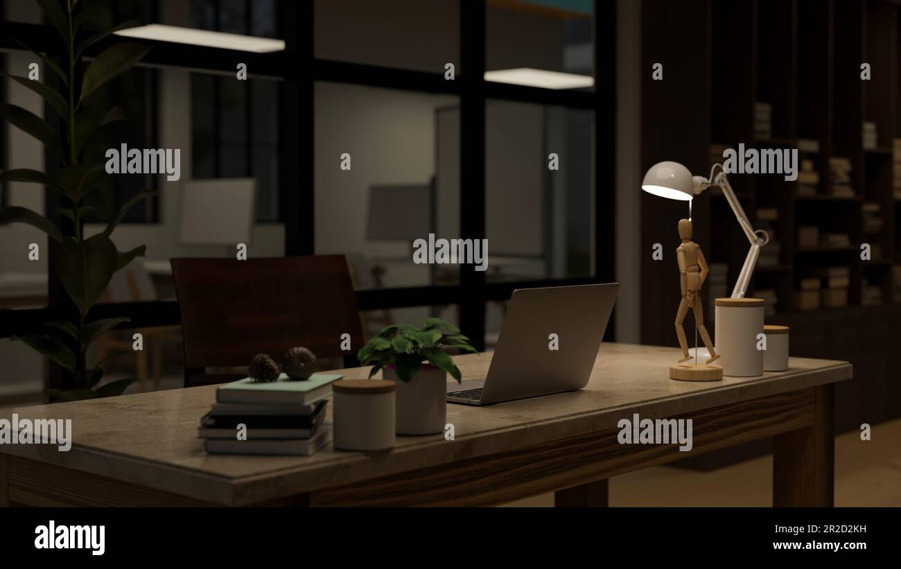 Interior design of a modern office at night with laptop computer, table ...