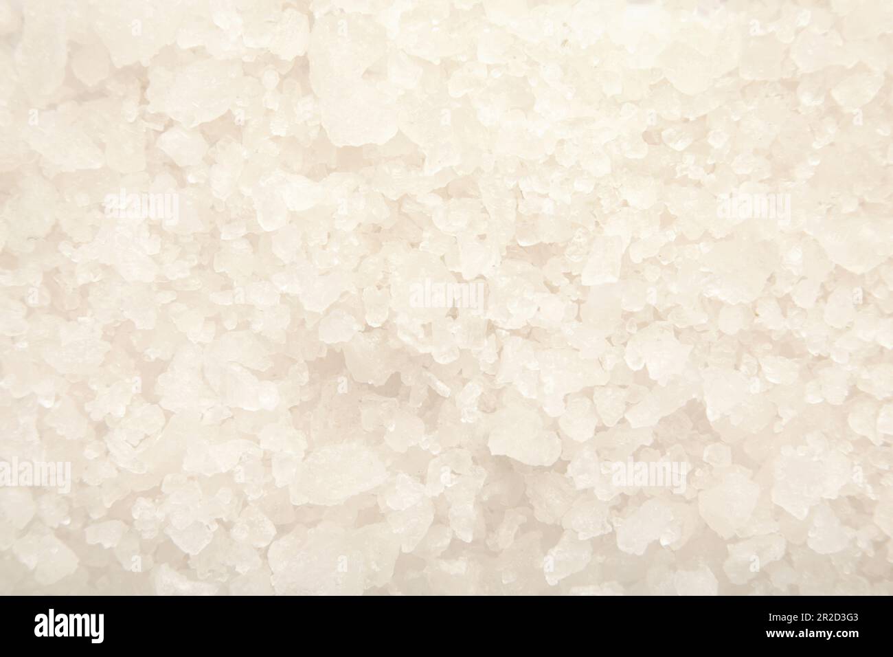 White sea salt background for text. Top view Stock Photo - Alamy