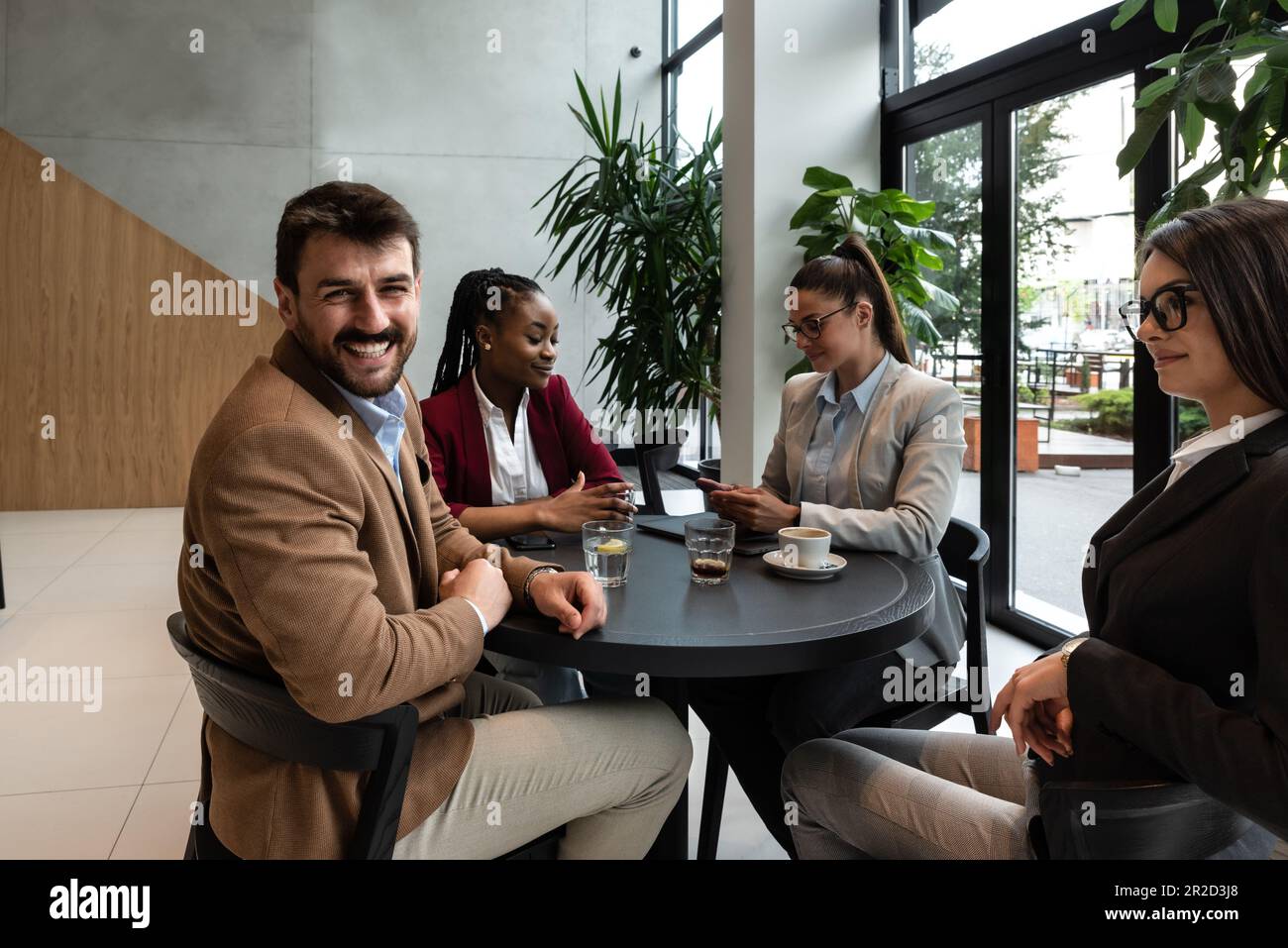 Group of young business people, managers, owners of a small company new ...