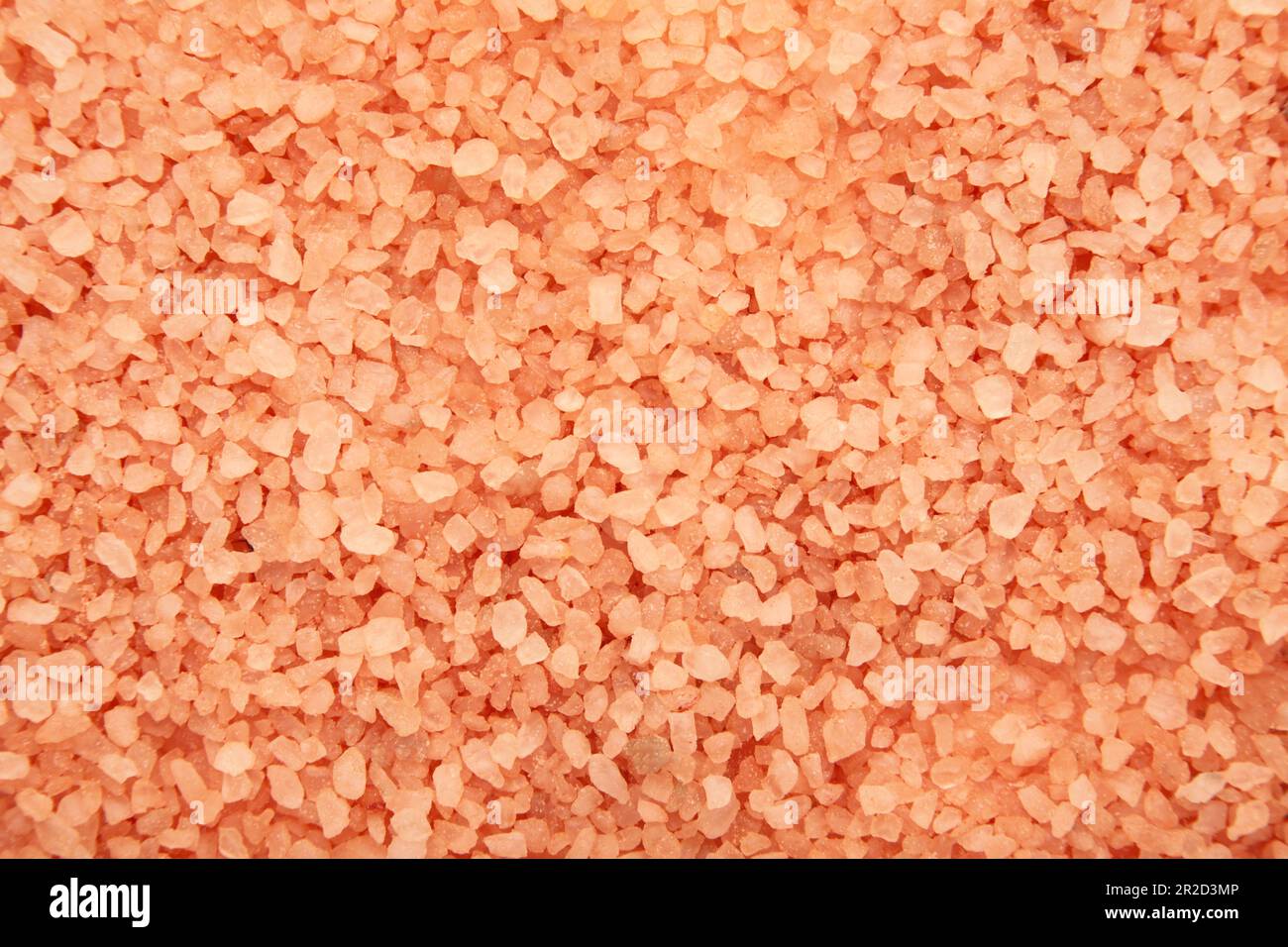 Yellow sea salt background for text. Top view Stock Photo - Alamy