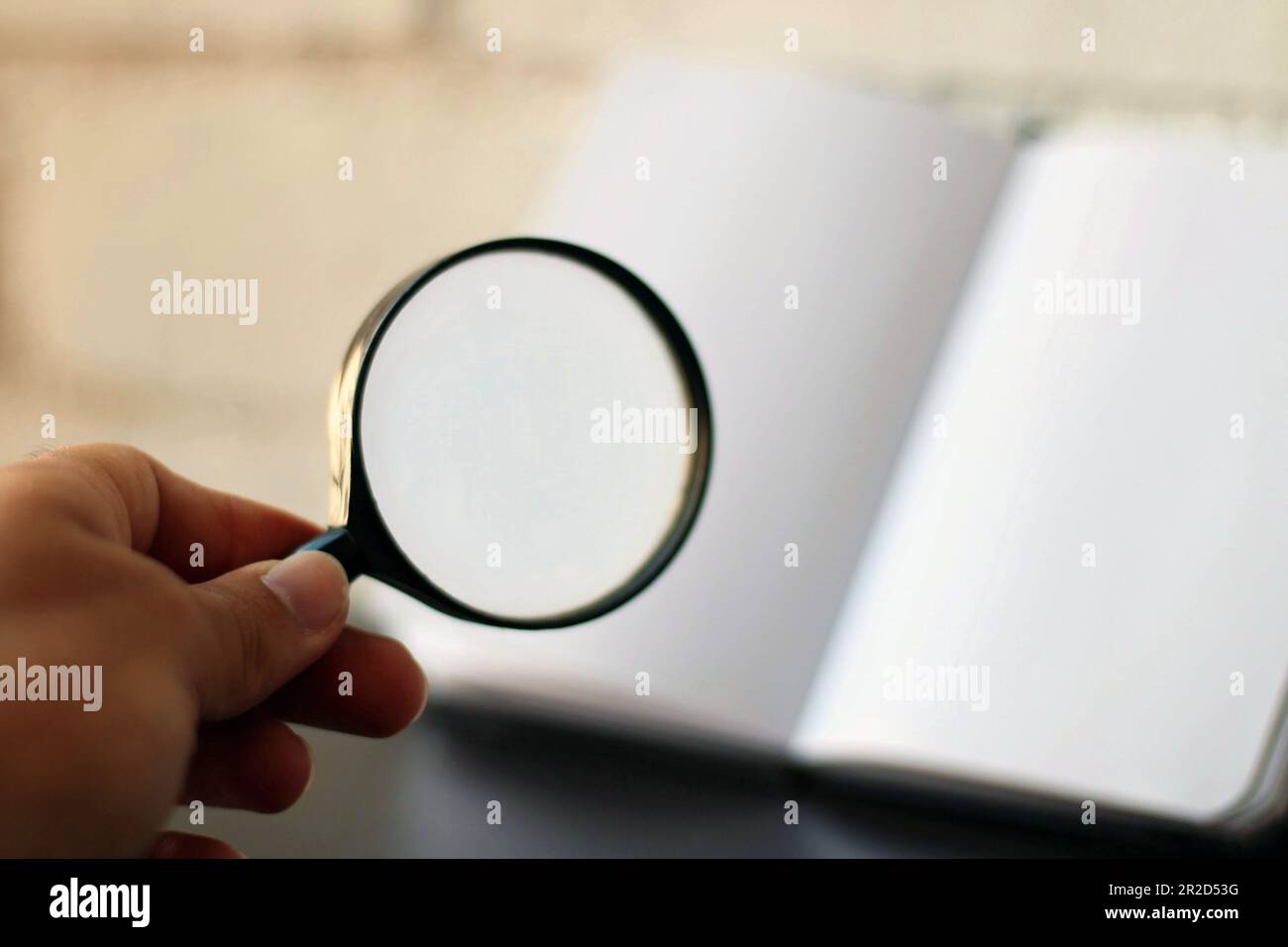 Doctor taking a magnifying glass Stock Photo - Alamy