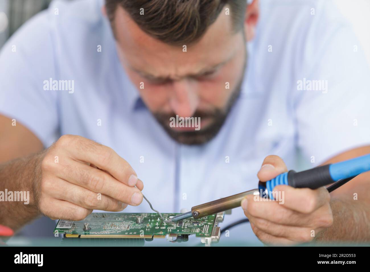 technician repairing a computer mainboard Stock Photo - Alamy