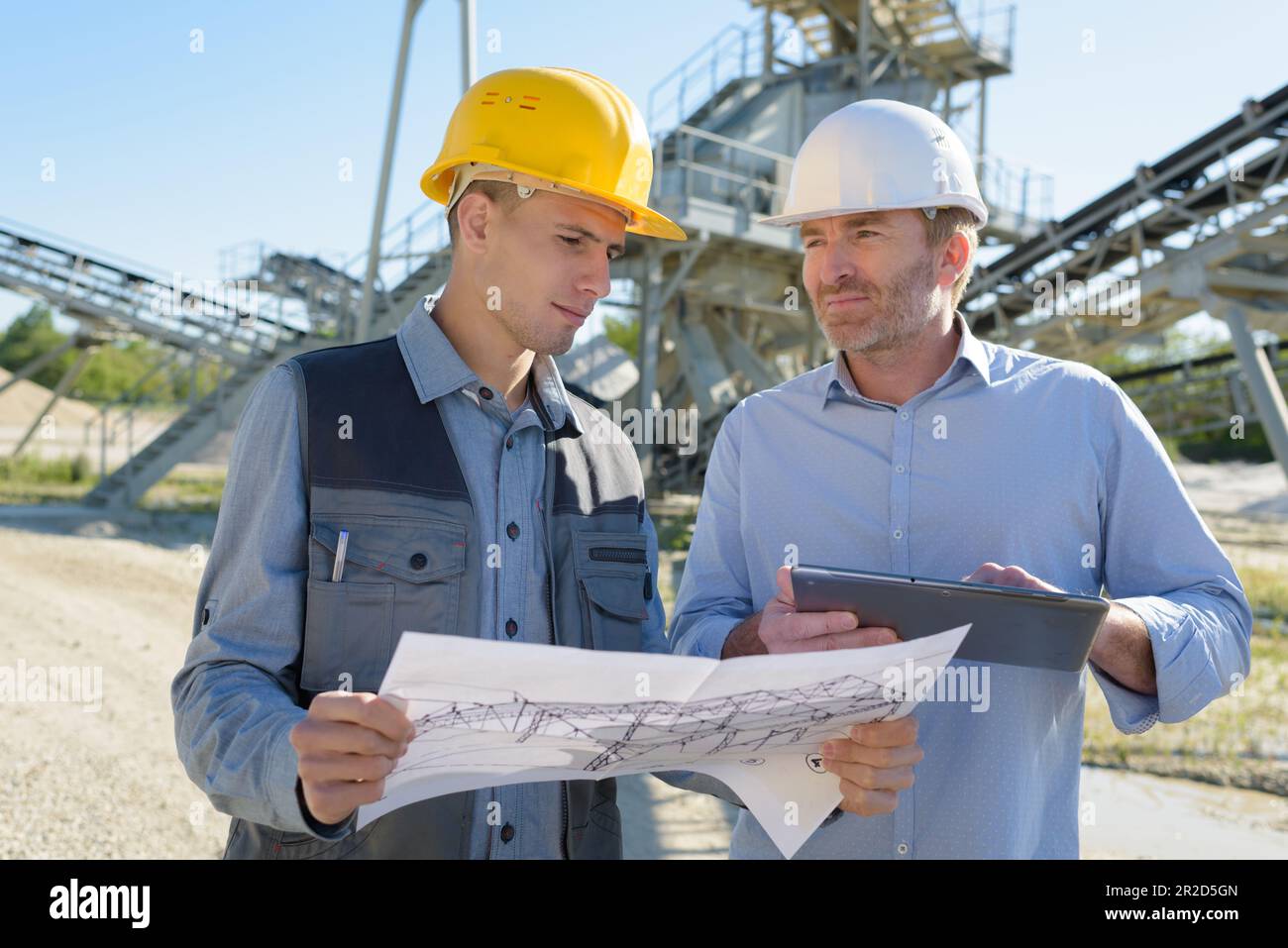 two engineers at industrial facility Stock Photo - Alamy