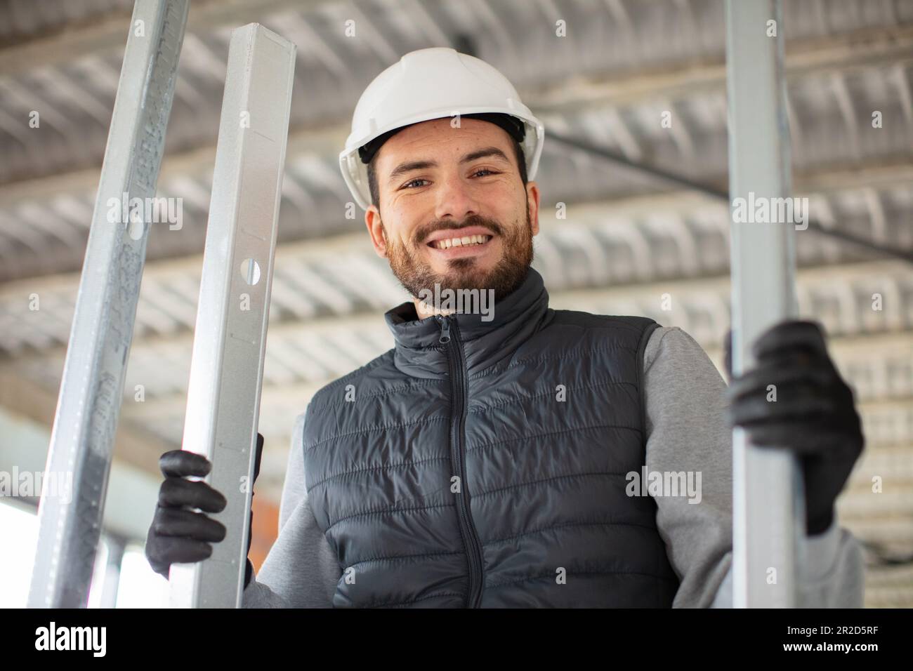 Construction holding rebar construction site hi-res stock photography ...