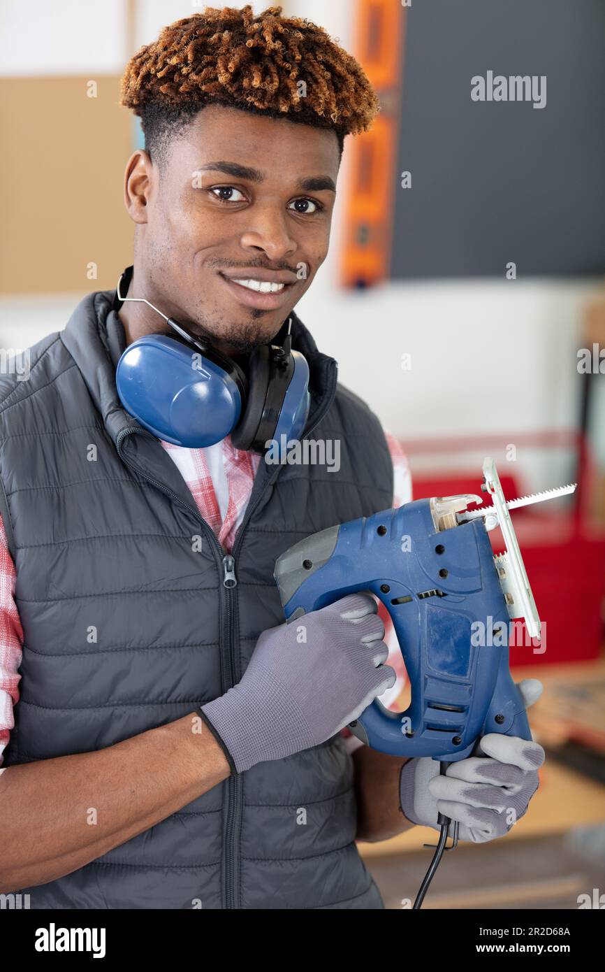 male engineer controlling process of cutting steel Stock Photo - Alamy