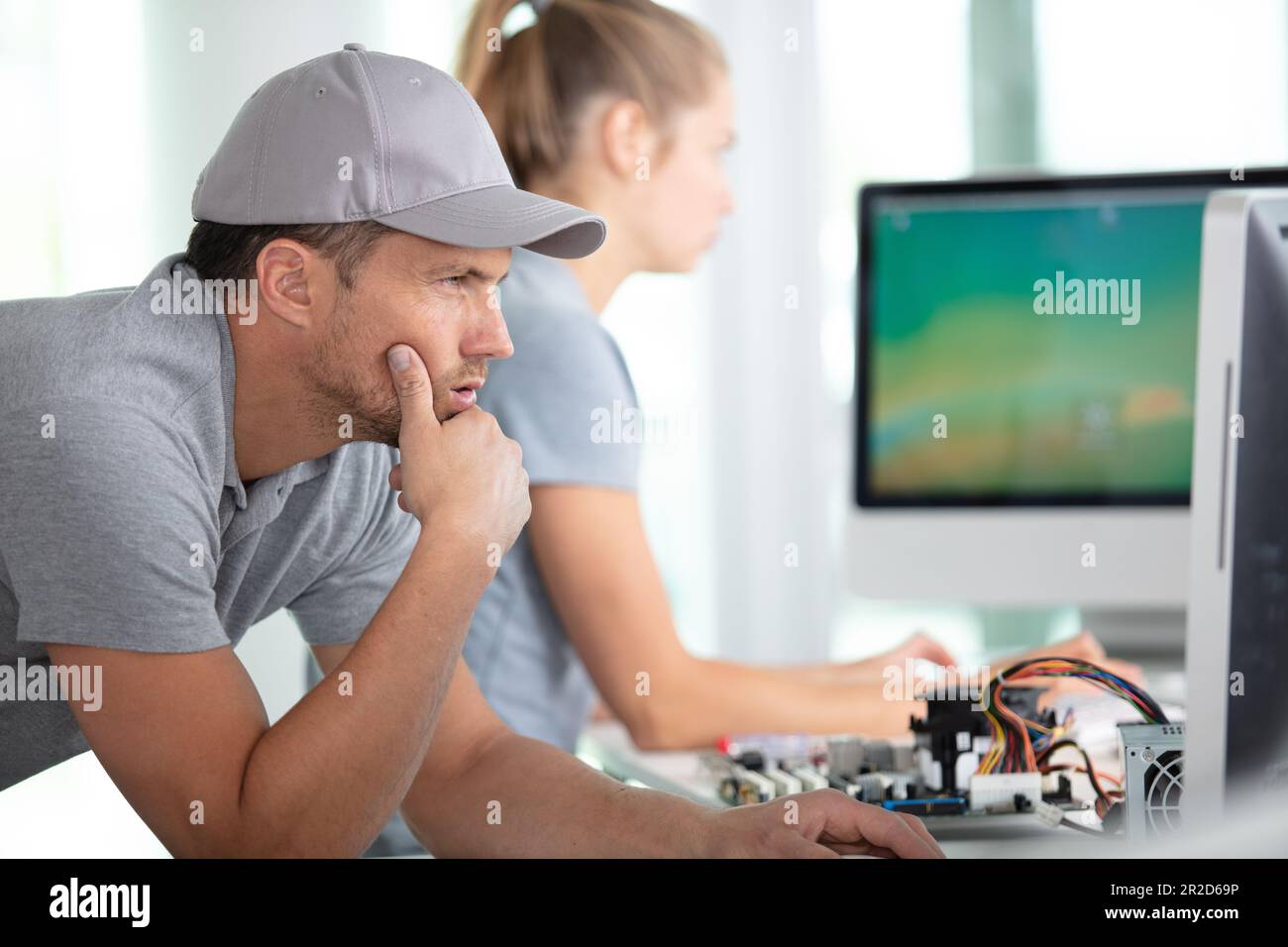 portrait of smiling female student in computer class Stock Photo - Alamy