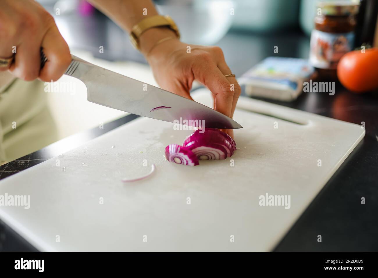 Chef cutting red onion hi-res stock photography and images - Alamy