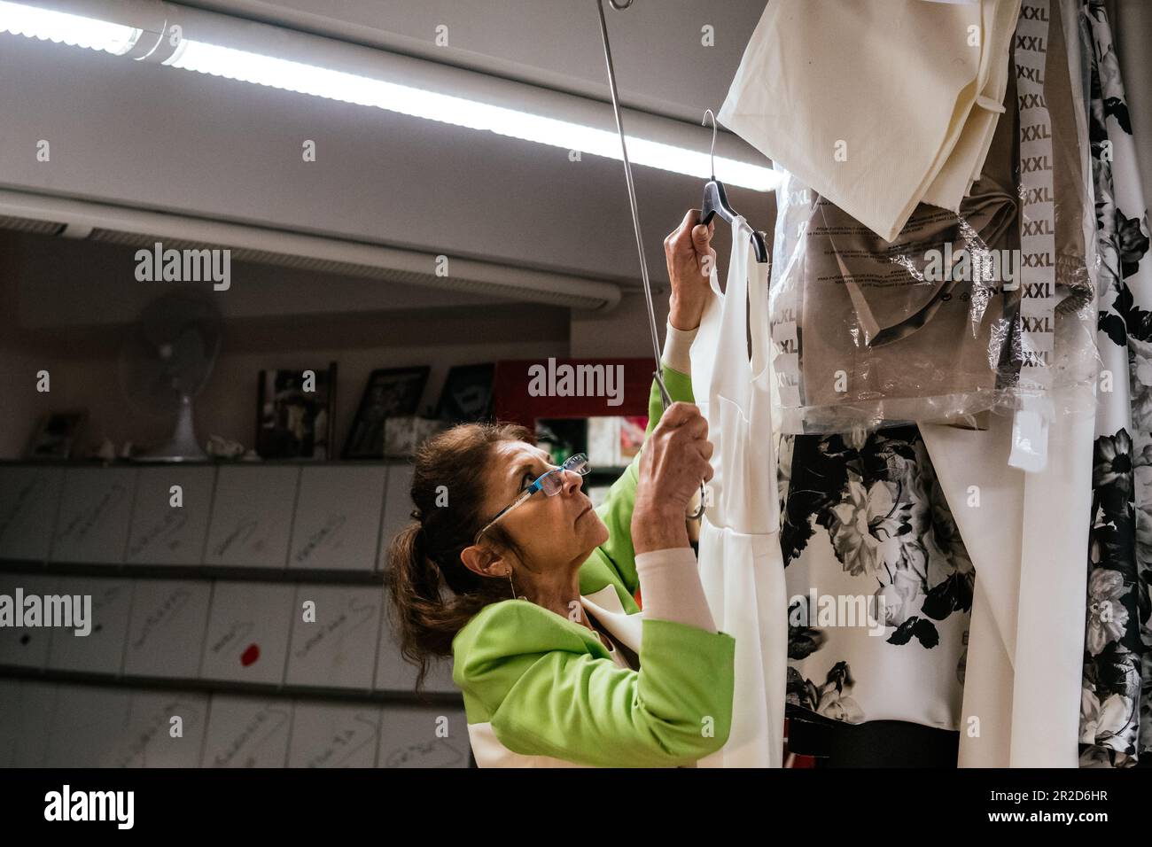 Designer dress hanger hi-res stock photography and images - Alamy