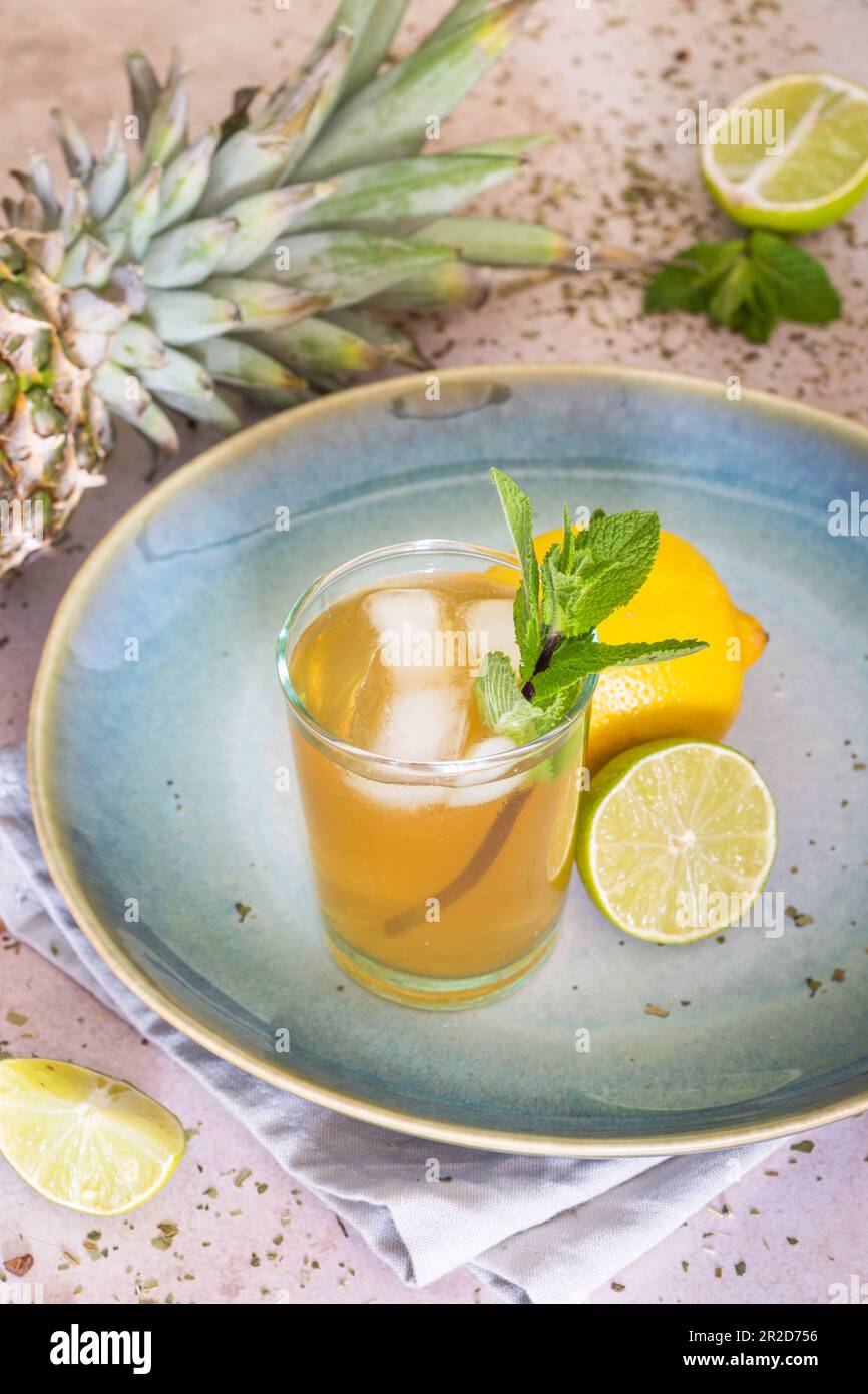 A glass of ice-tea with fresh fruit Stock Photo - Alamy