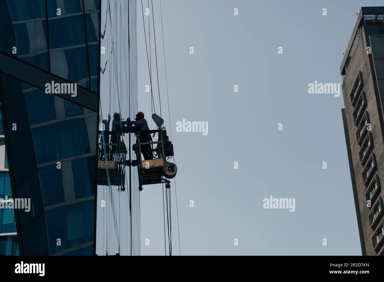 Construction worker cleaning building hi-res stock photography and ...