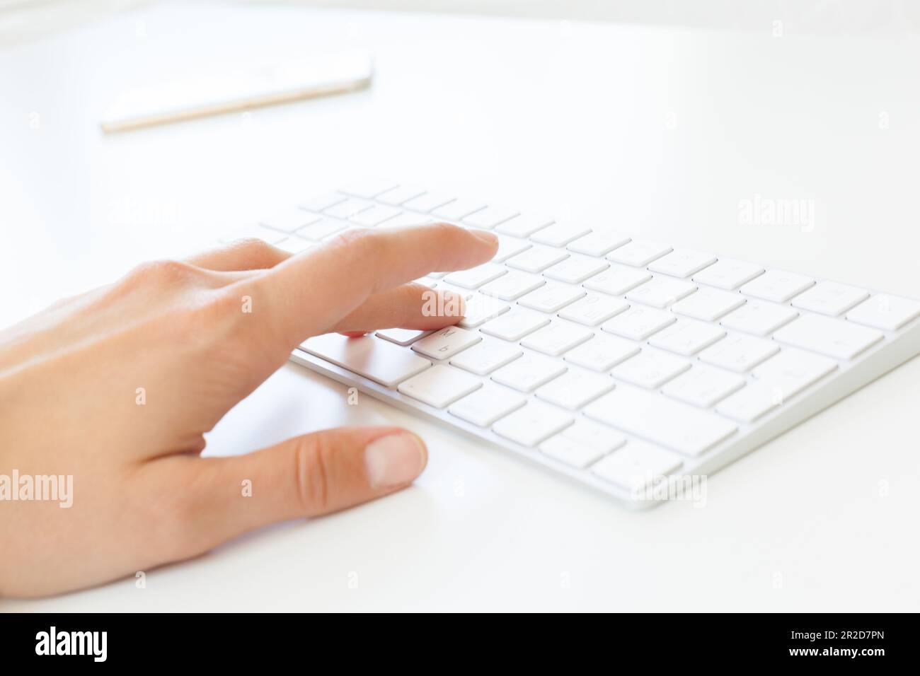 Woman's hands using keyboard at the office Stock Photo - Alamy
