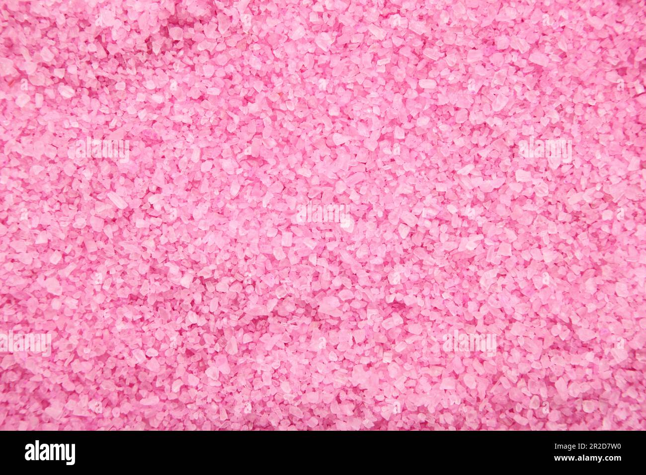 Himalayan pink salt background for text. Top view Stock Photo - Alamy