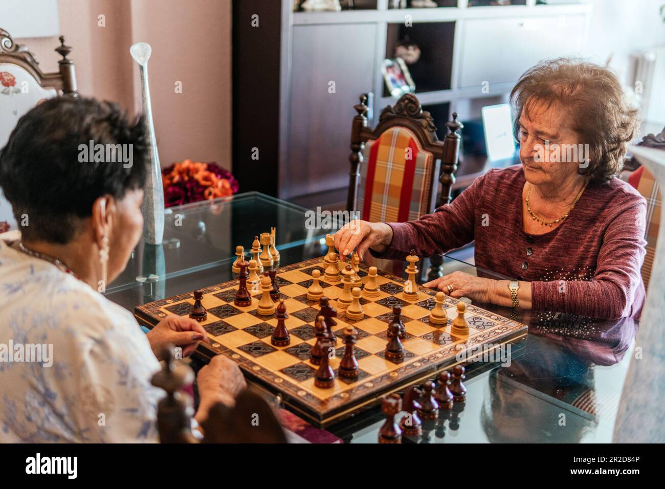 Senior women friends playing game hi-res stock photography and images ...
