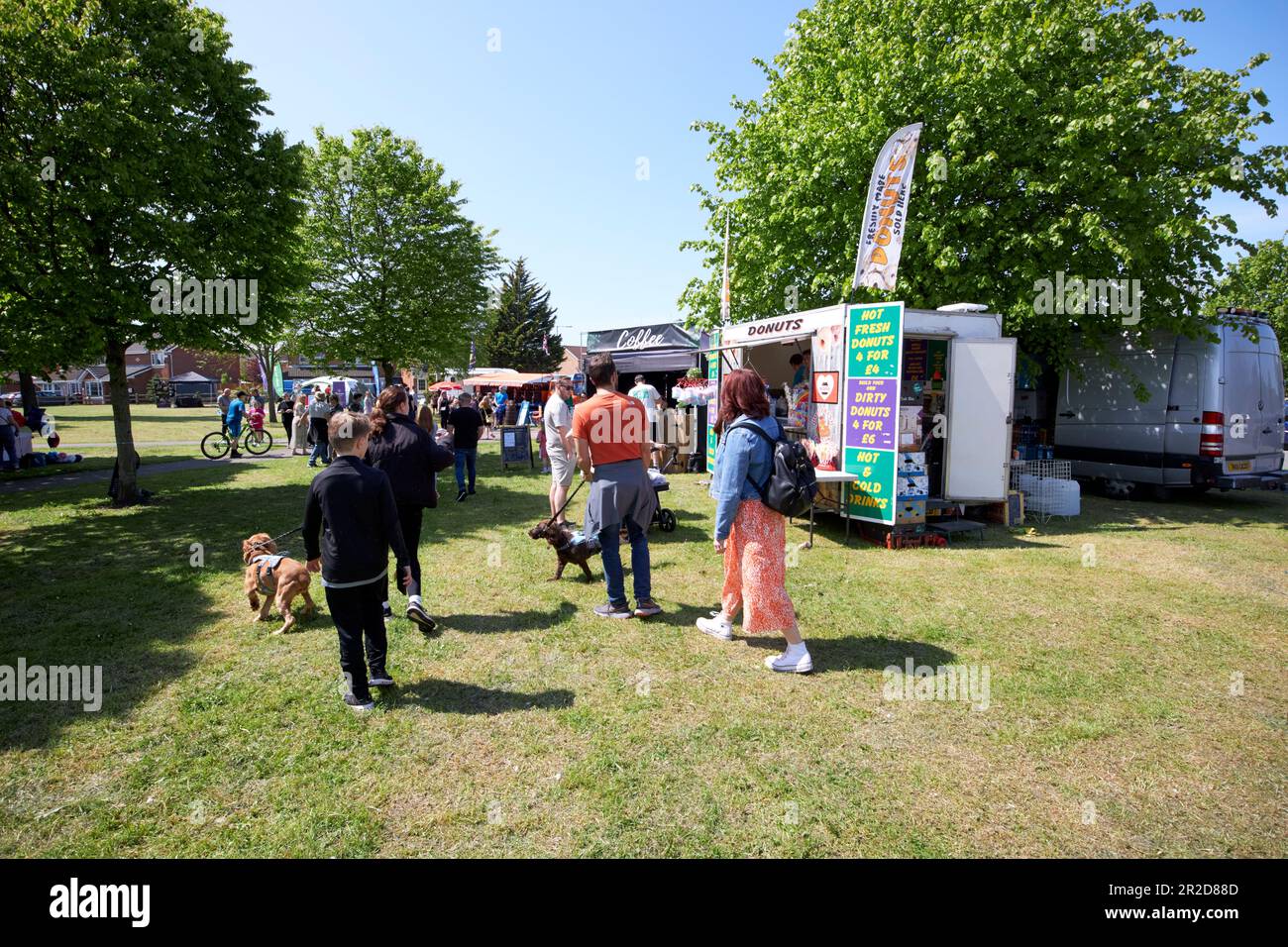 food stands at a local community summer fair simonswood england uk ...
