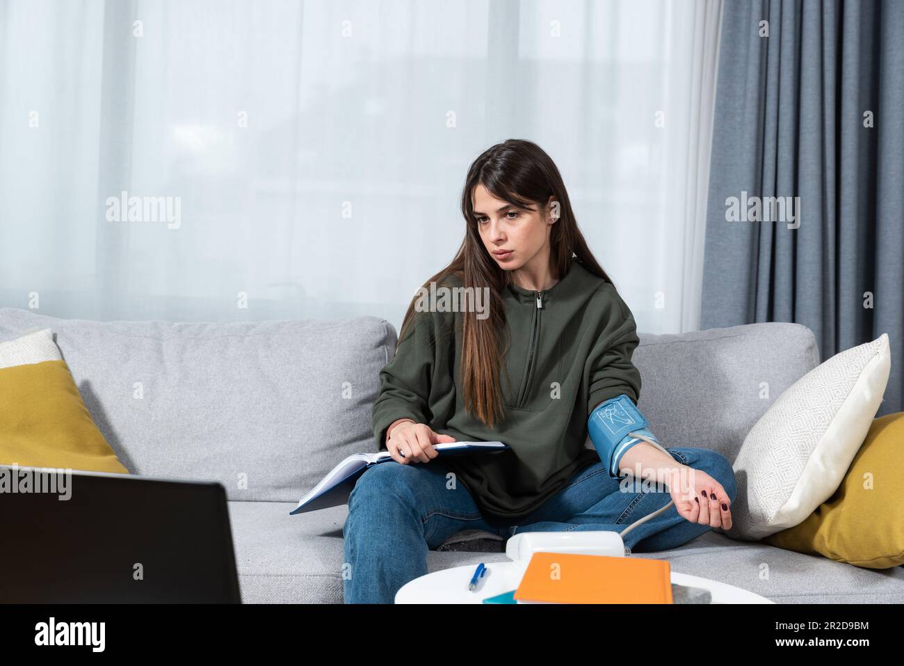 Weak sick millennial business female sitting on couch at living room ...