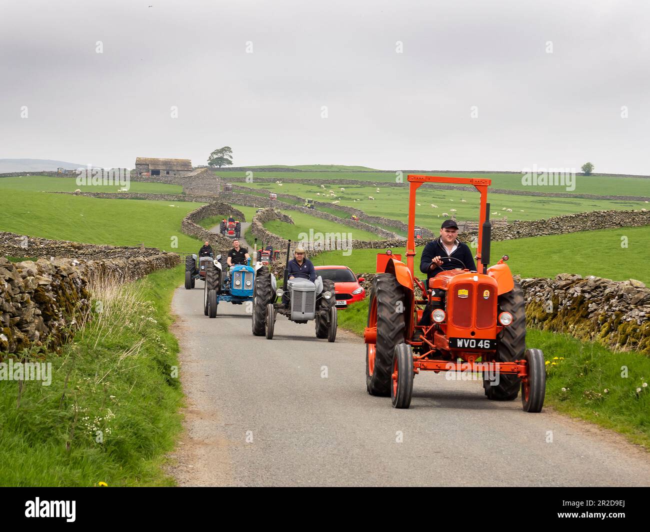 A tractor run on a road above Settle, Yorkshire Dales, UK Stock Photo ...