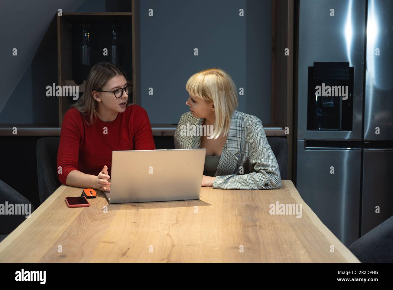 Two Happy Ladies Using Laptop Computer Working And Learning Online ...