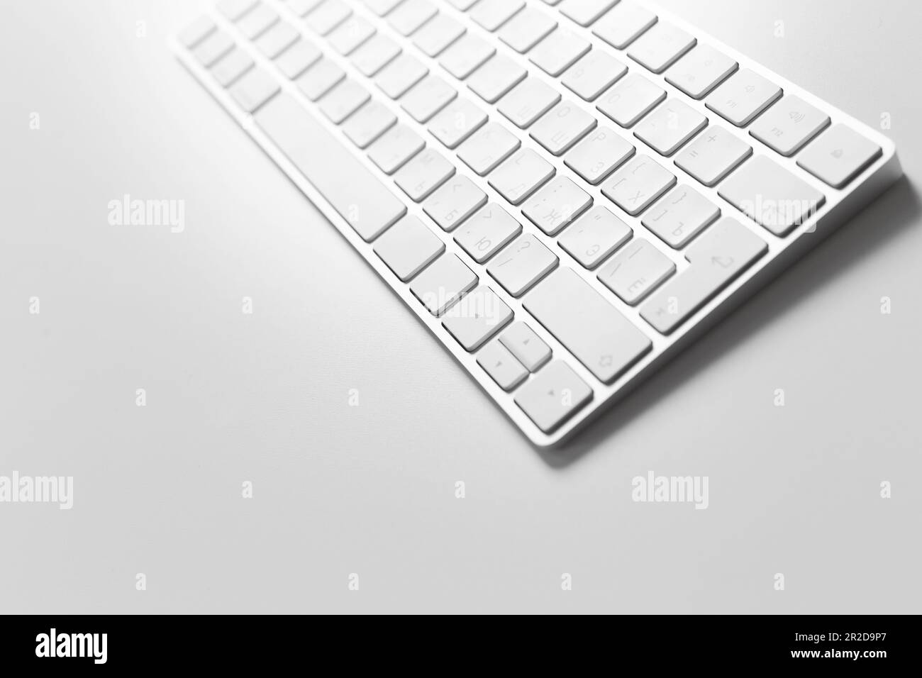 Office table with keyboard Isolated on white background Stock Photo - Alamy