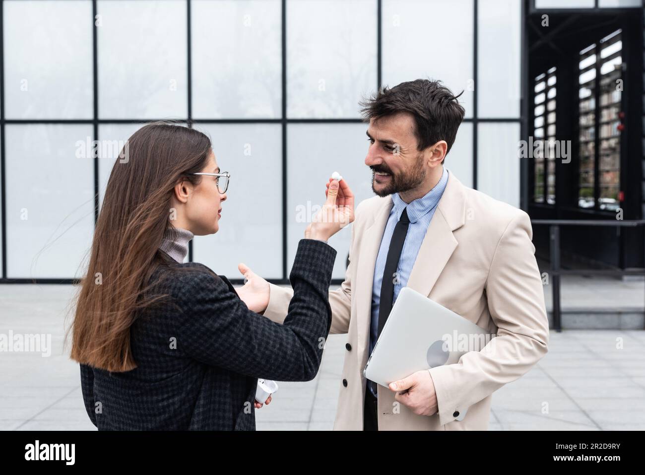 Business team colleagues partners standing in front of office building ...