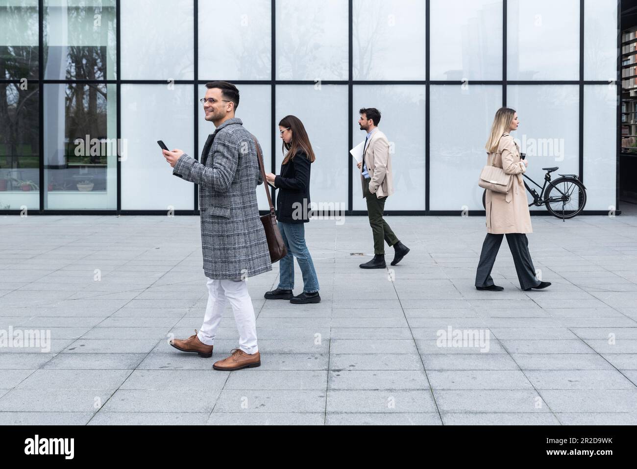 Think different concept. Group of business people in front of office ...