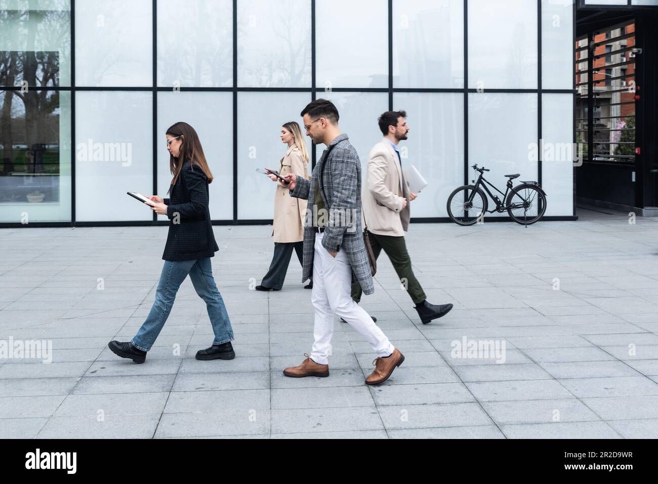 Think different concept. Group of business people in front of office ...