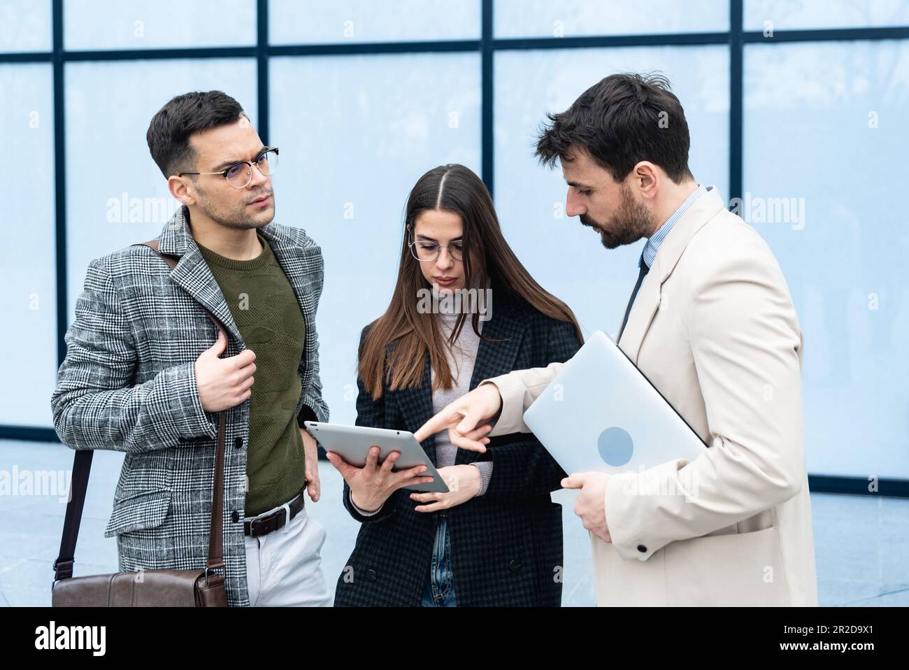 Group of creative business people working on social media strategy ...