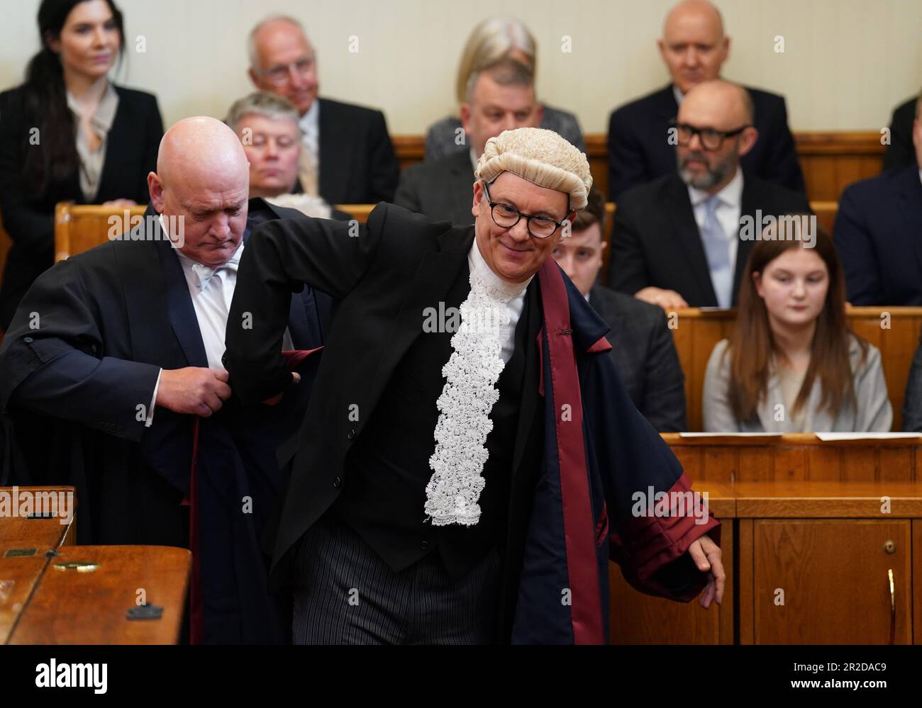 Sheriff Principal Craig Turnbull is given his robes as he is installed ...