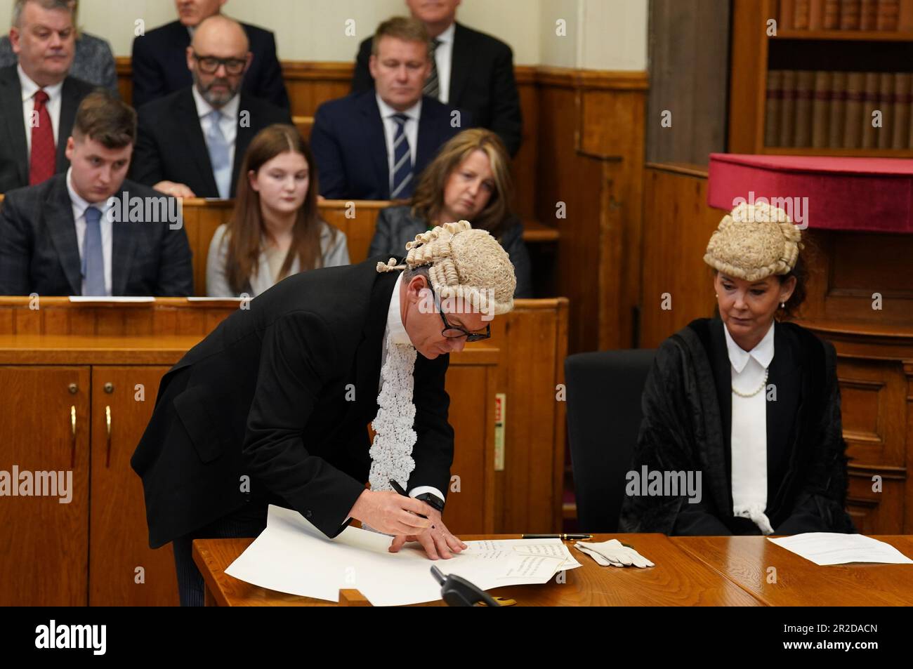 Sheriff Principal Craig Turnbull signs the declaration watched by Lord ...