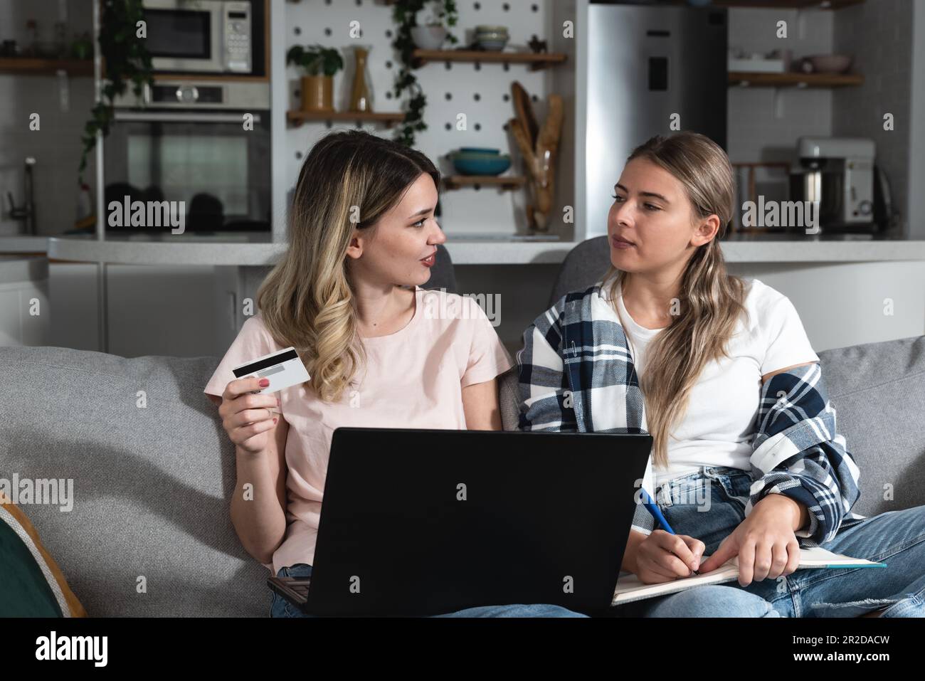 Two Happy Ladies Using Laptop Computer Working And Learning Online ...