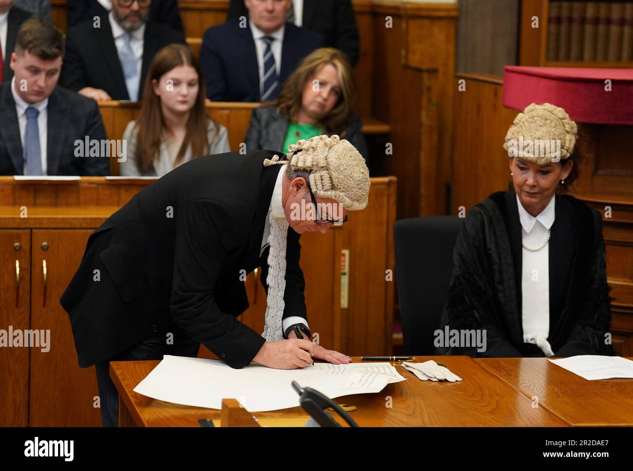 Sheriff Principal Craig Turnbull signs the declaration watched by Lord ...