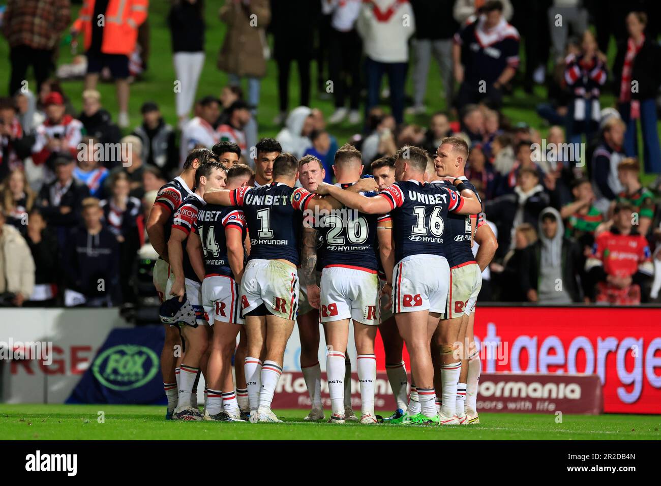 The Roosters huddle after their narrow loss during the NRL Round 12 ...