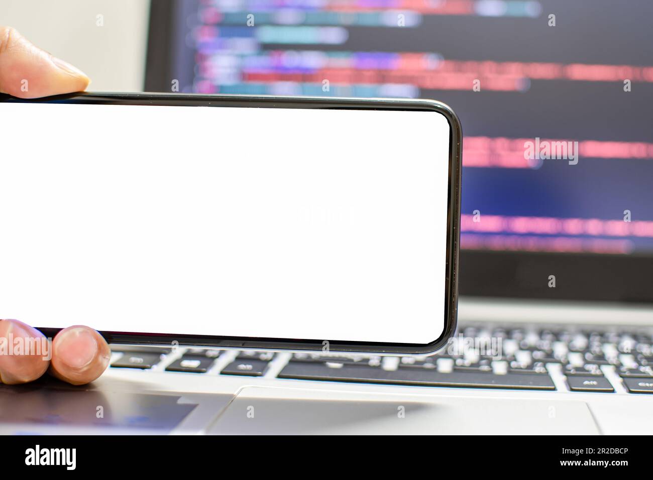 The developer wants to run an app on the smartphone device after coding ...