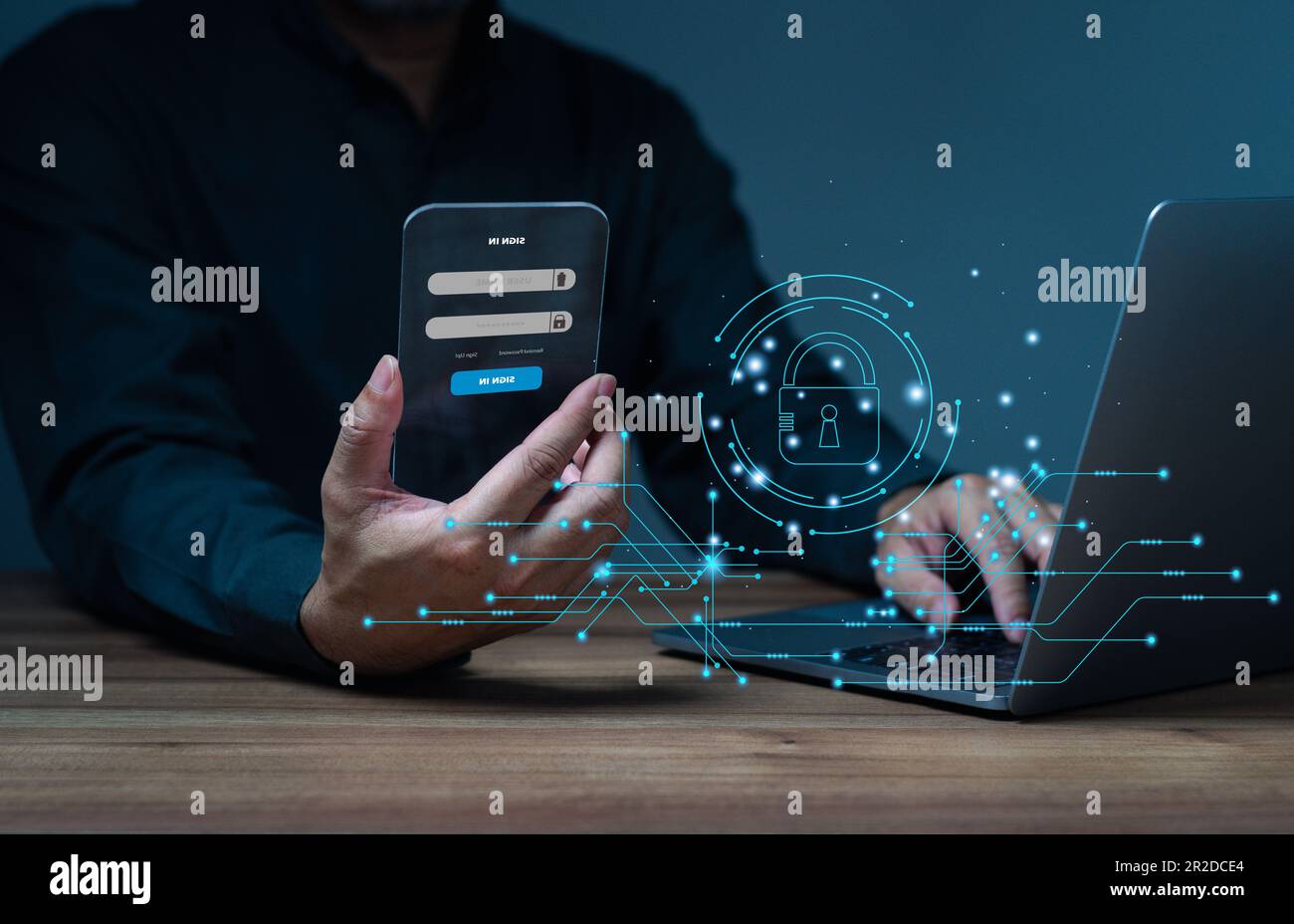 Businessman sign in for protecting personal data on smart phone with virtual screen interfaces ...