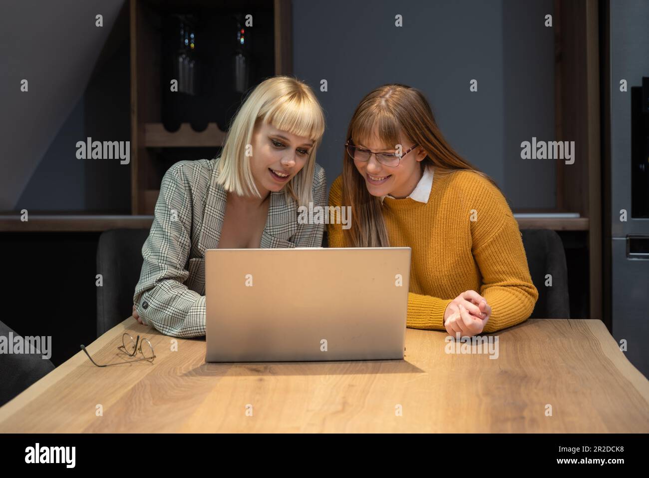 Two female friends business partners owners of small interior ...
