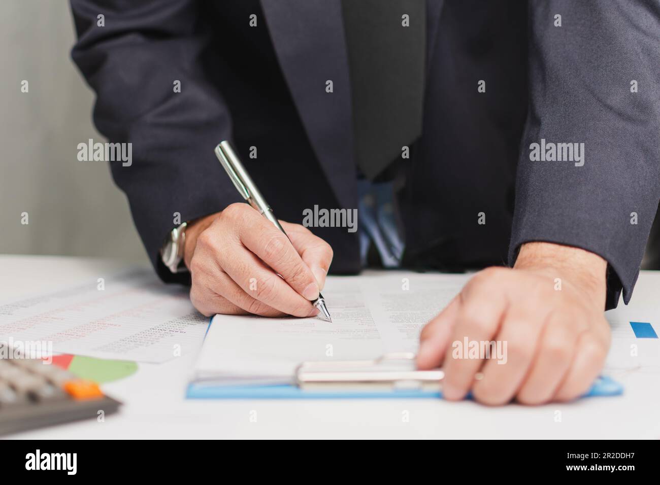 professional businessman wear suit hand holding pen writing and sign ...