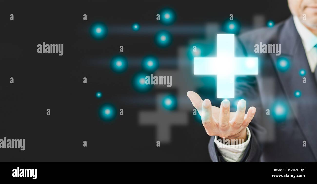 professional Businessman hand holding symbol cross shape with the ...