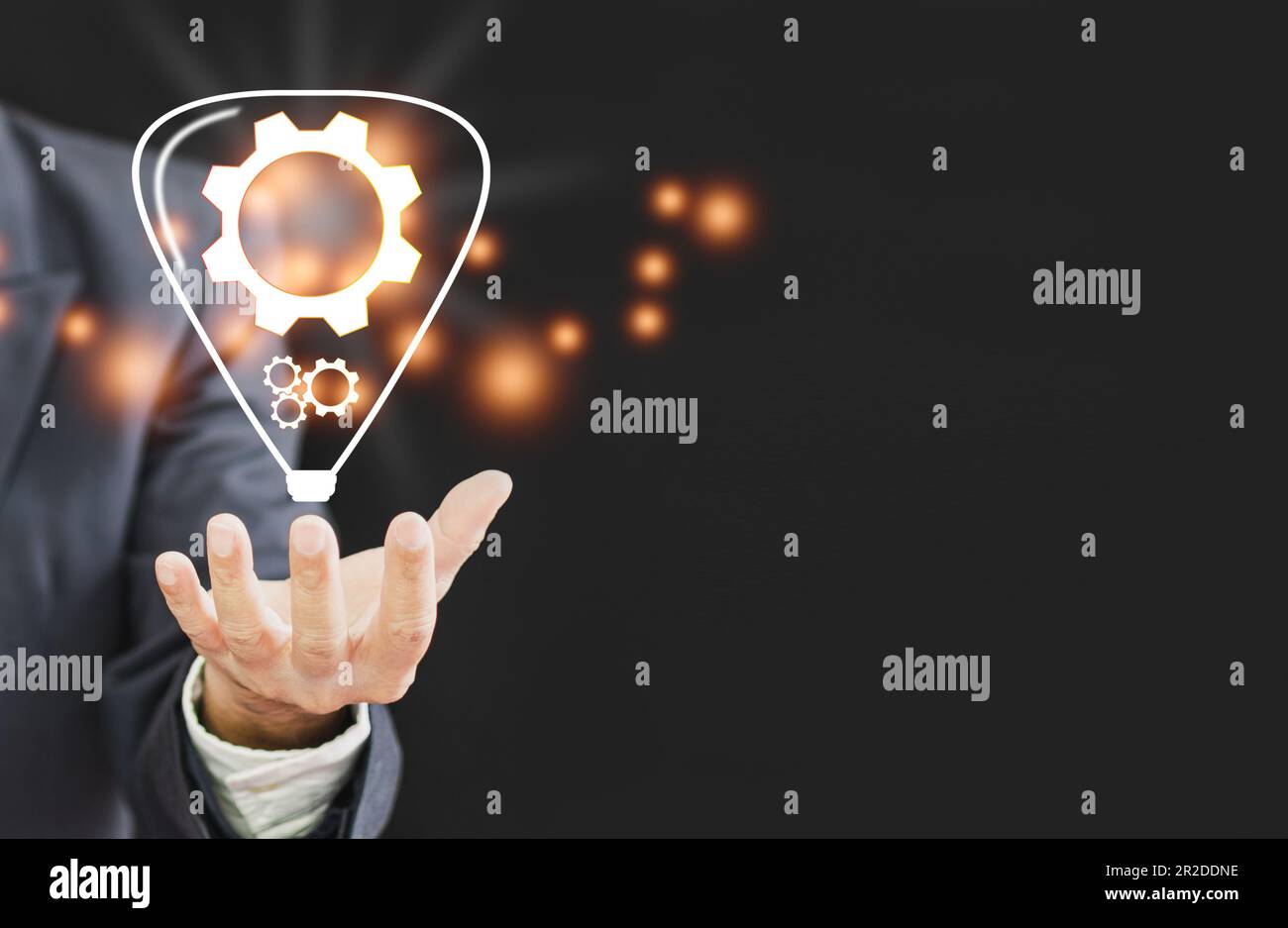 person businessman hand holding the light bulb, a concept for idea ...